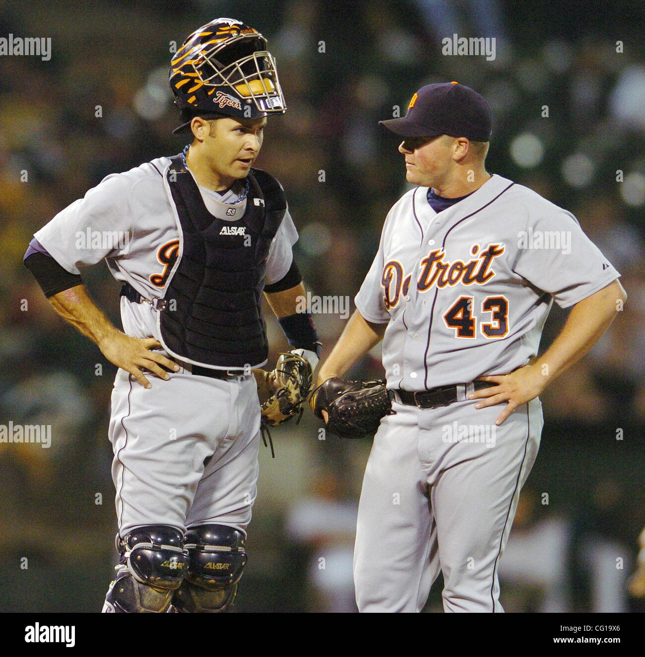 Detroit Tigers Mike Rabelo (left) and Macay McBride met at the mound ...