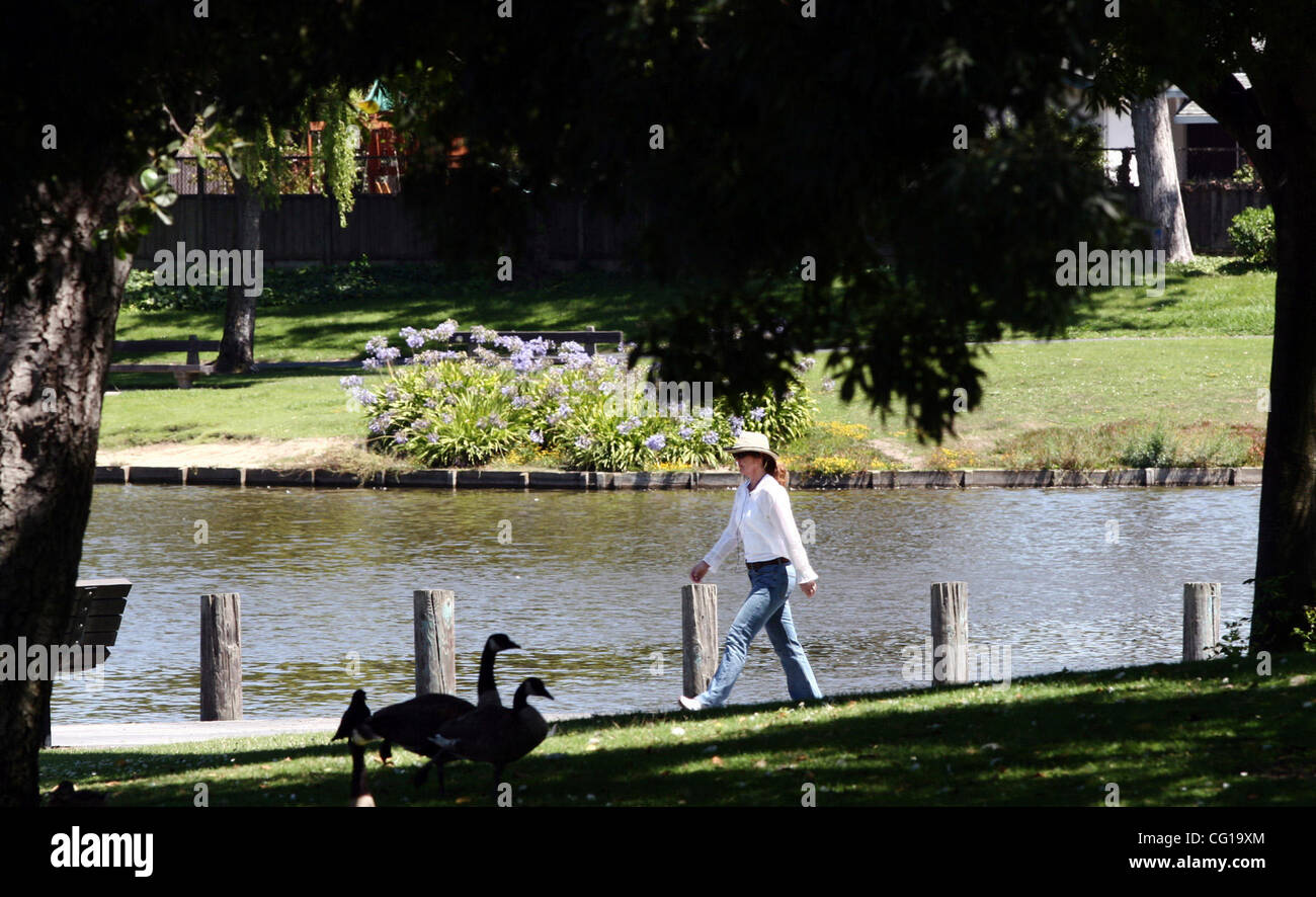 Tracy Grogan, who works in Newark, walks around The Lake in Newark ...