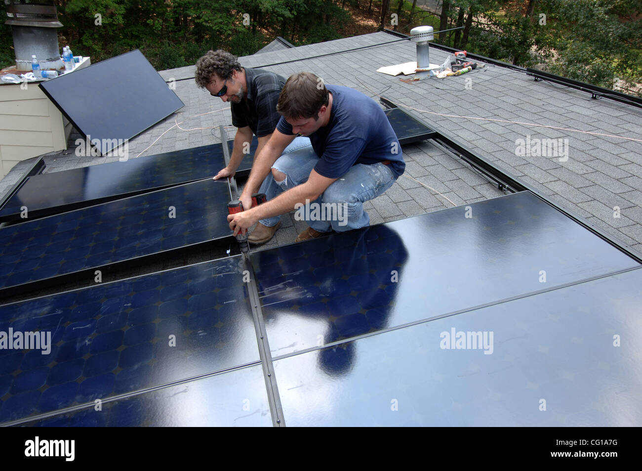 Solar photovoltaic panels installed on single family residential roof ...