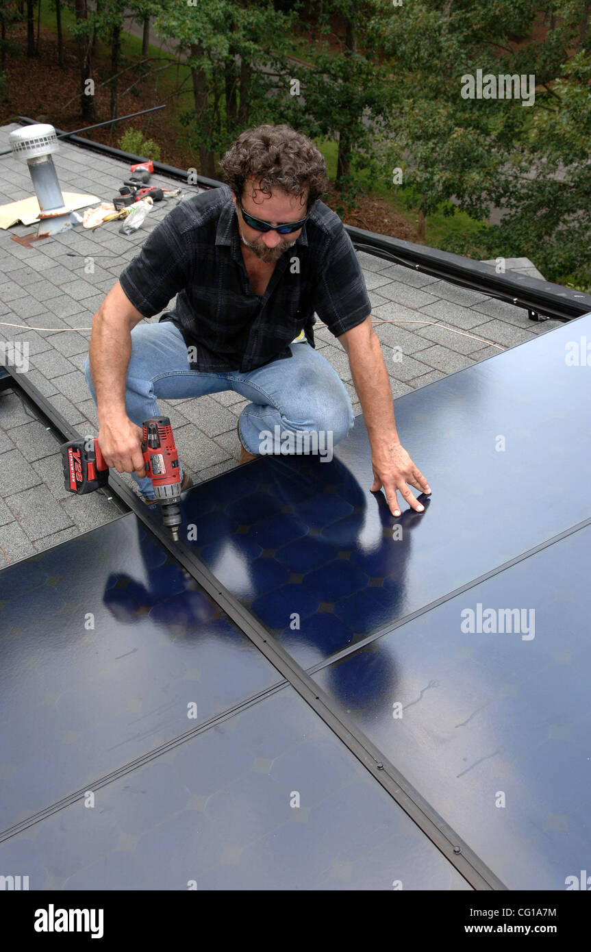 Solar photovoltaic panels installed on single family residential roof ...