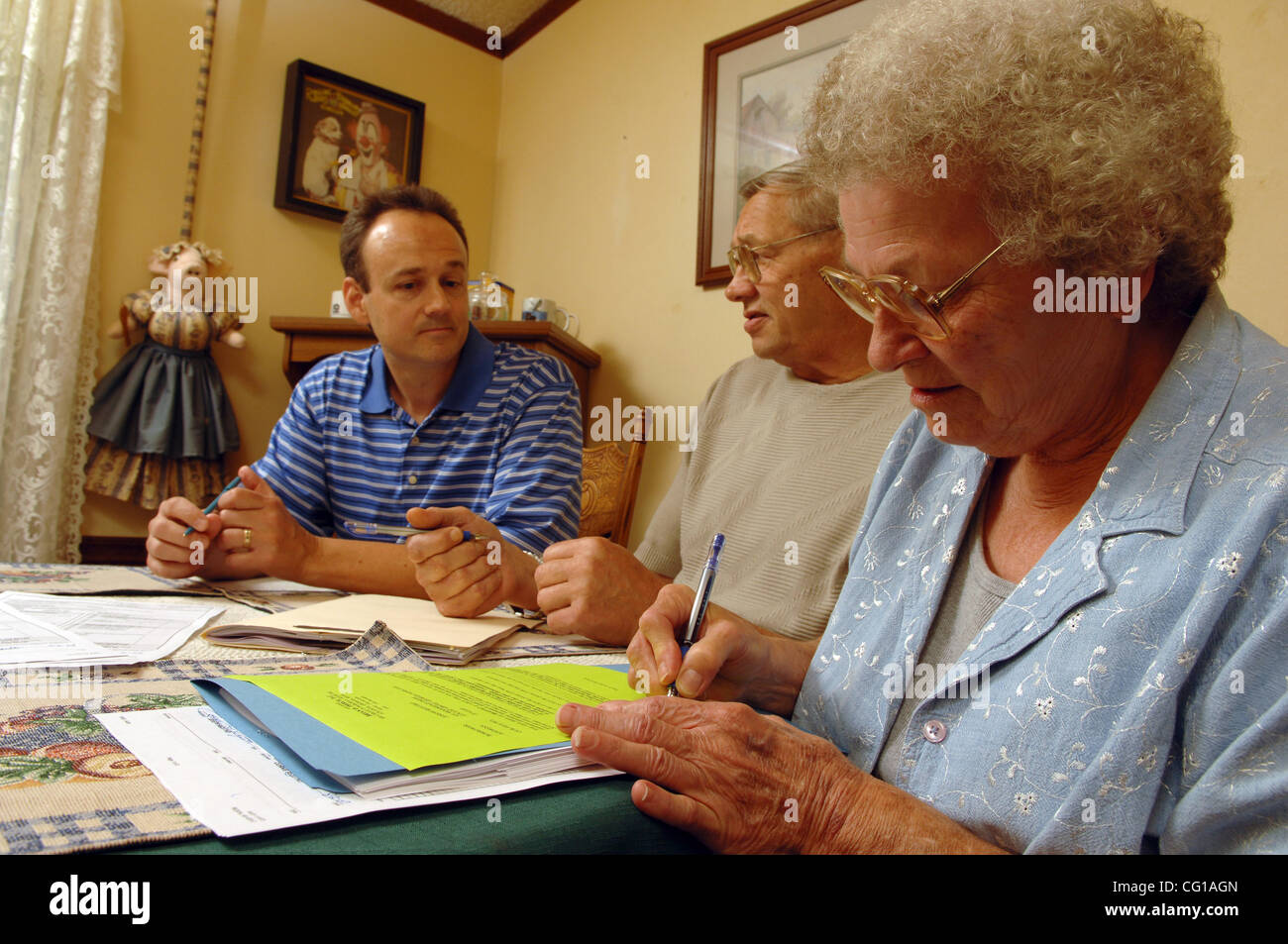Joseph Rezutko, 68, and his wife Connie, 65, Locust Grove, GA go over ...