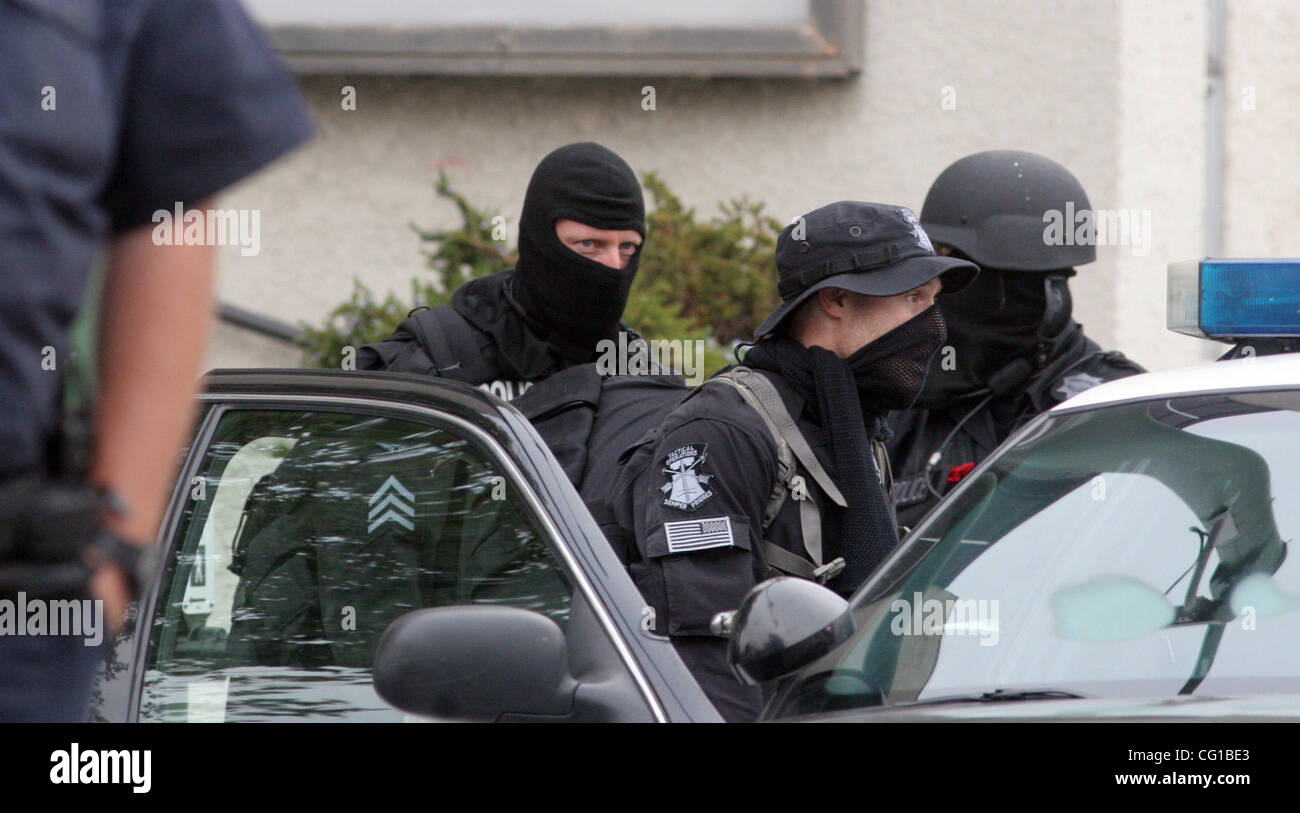 Swat teams were out in force early Friday morning, August 3, 2007 ...