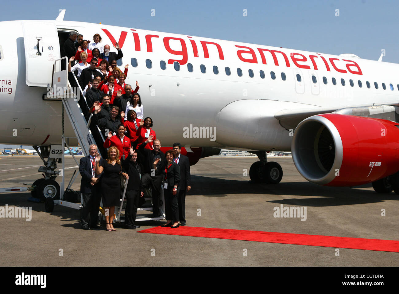 LOS ANGELES, CA - AUGUST 08: Virgin America crew celebrate before they ...