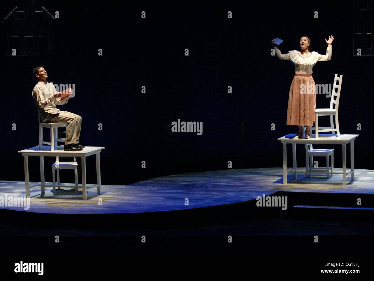 Thomas Glenn, as George Gibbs, and Marnie Breckenridge, as Emily Webb, perform during act 1 of ...