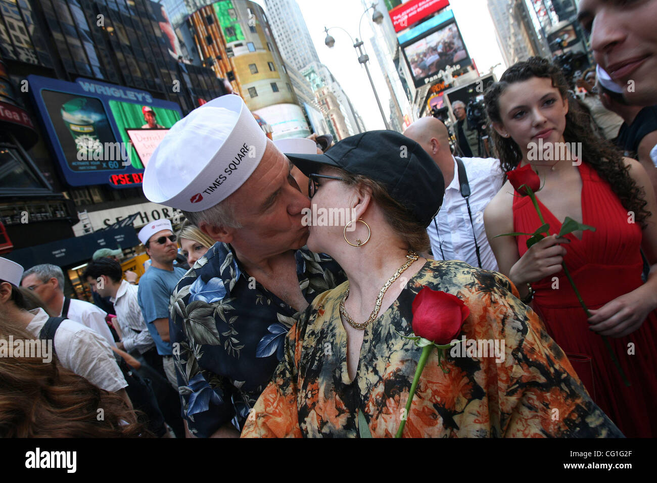 couples participate in a "kiss-in" in new york's times square august 14 ...