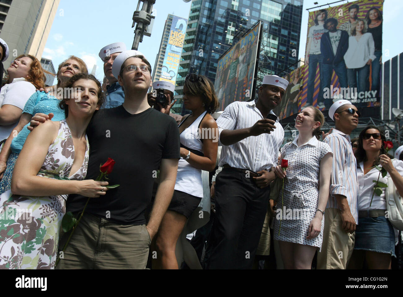 couples participate in a "kiss-in" in new york's times square august 14 ...
