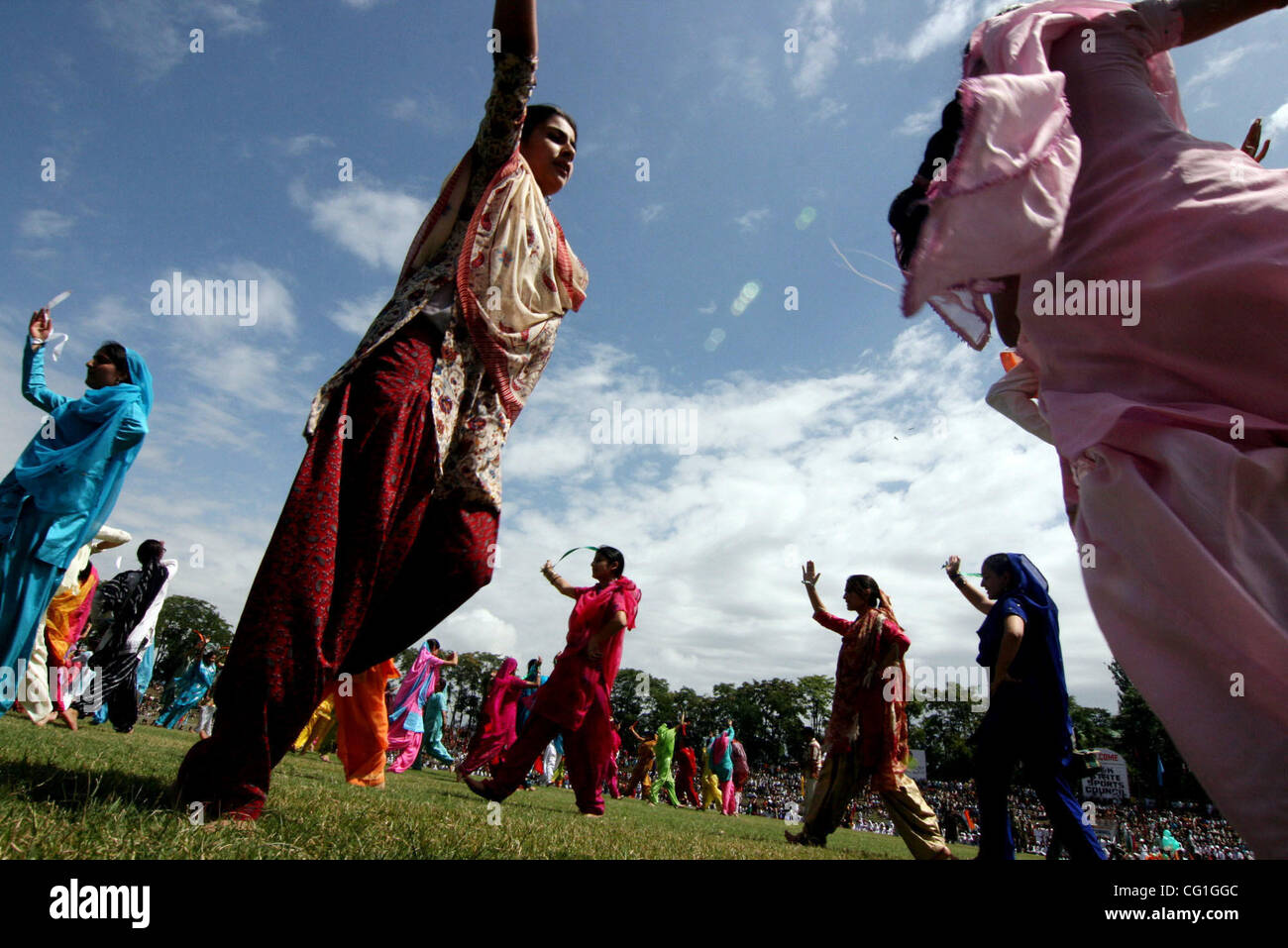 Kashmiri college girls perform a traditional dance during India's ...