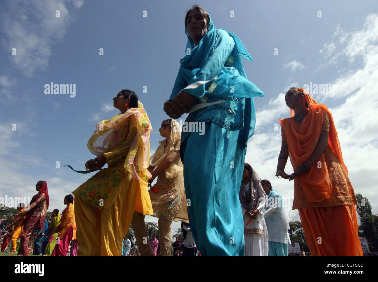 Kashmiri college girls perform a traditional dance during India's ...