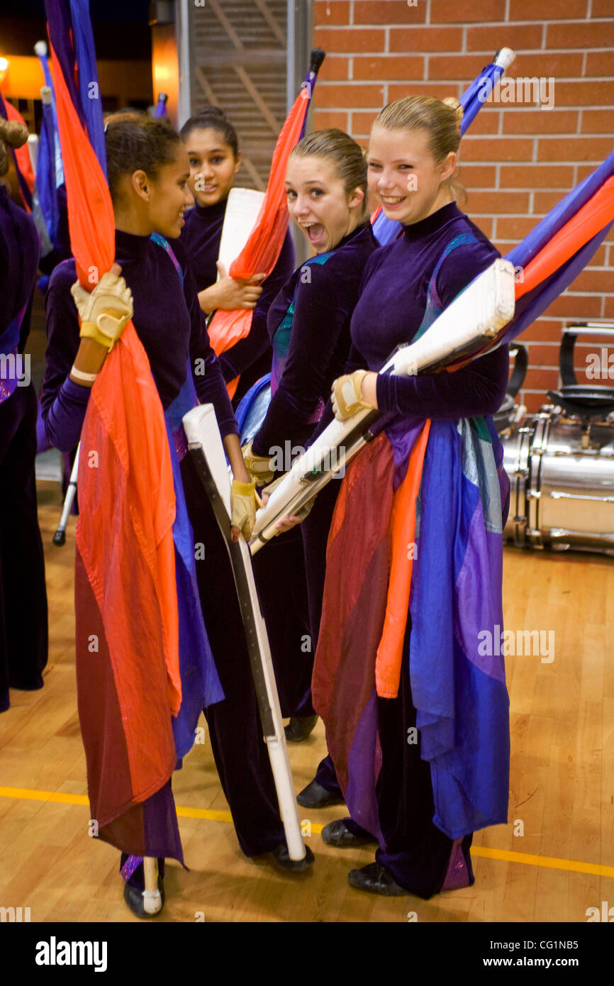 Carry banners and dummy rifles, color guard members of mixed ...