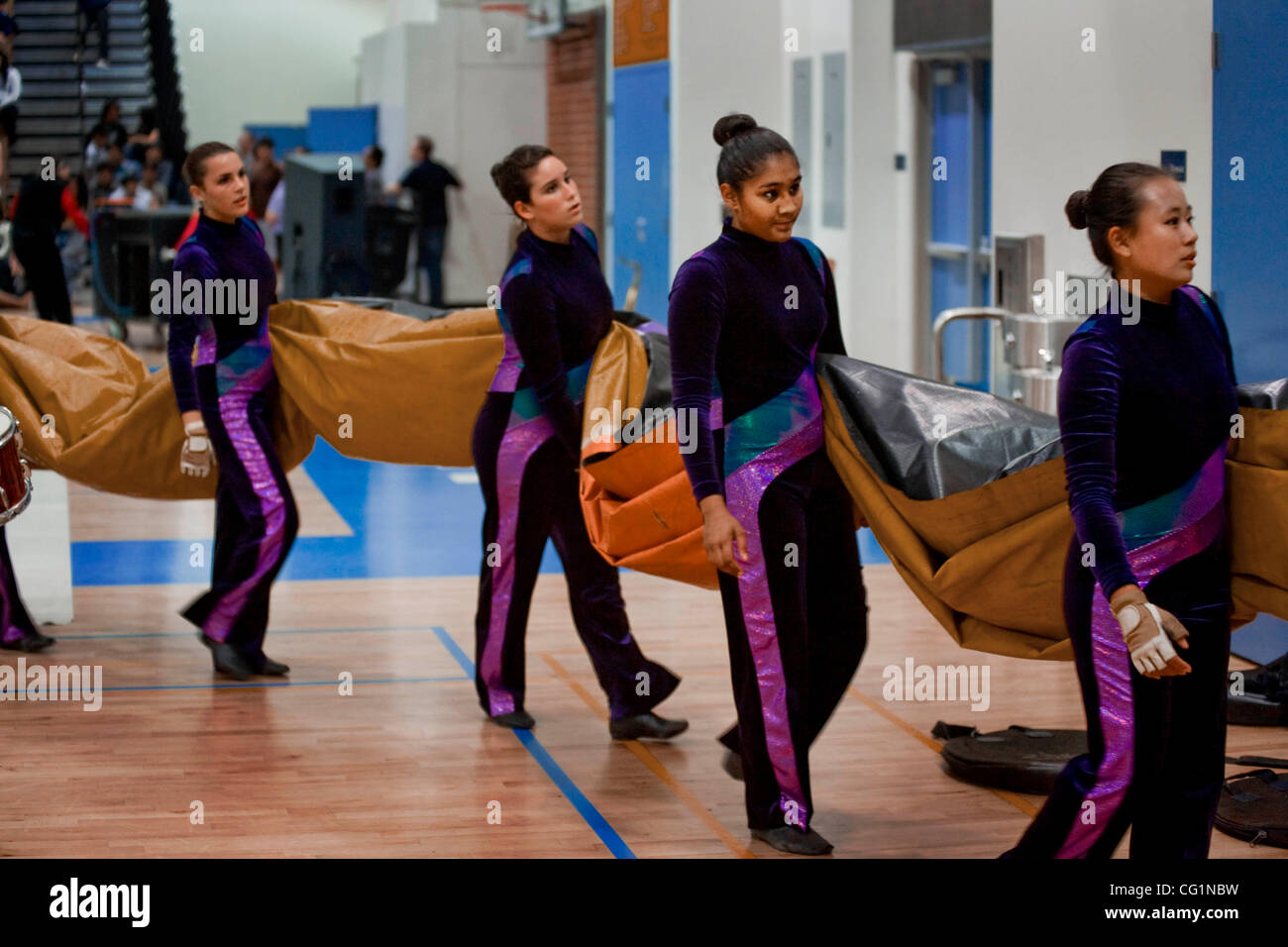 Female color guard members of Caucasian, Asian, and African-American ...