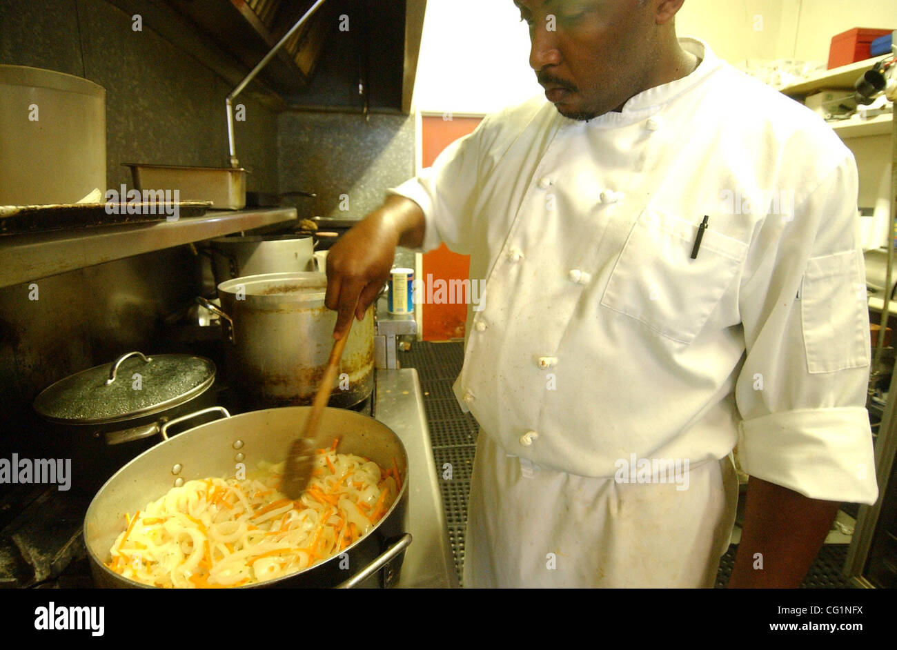 Chef Robert Simpson saute's onions Thursday, August 23, 2007, at Back A ...