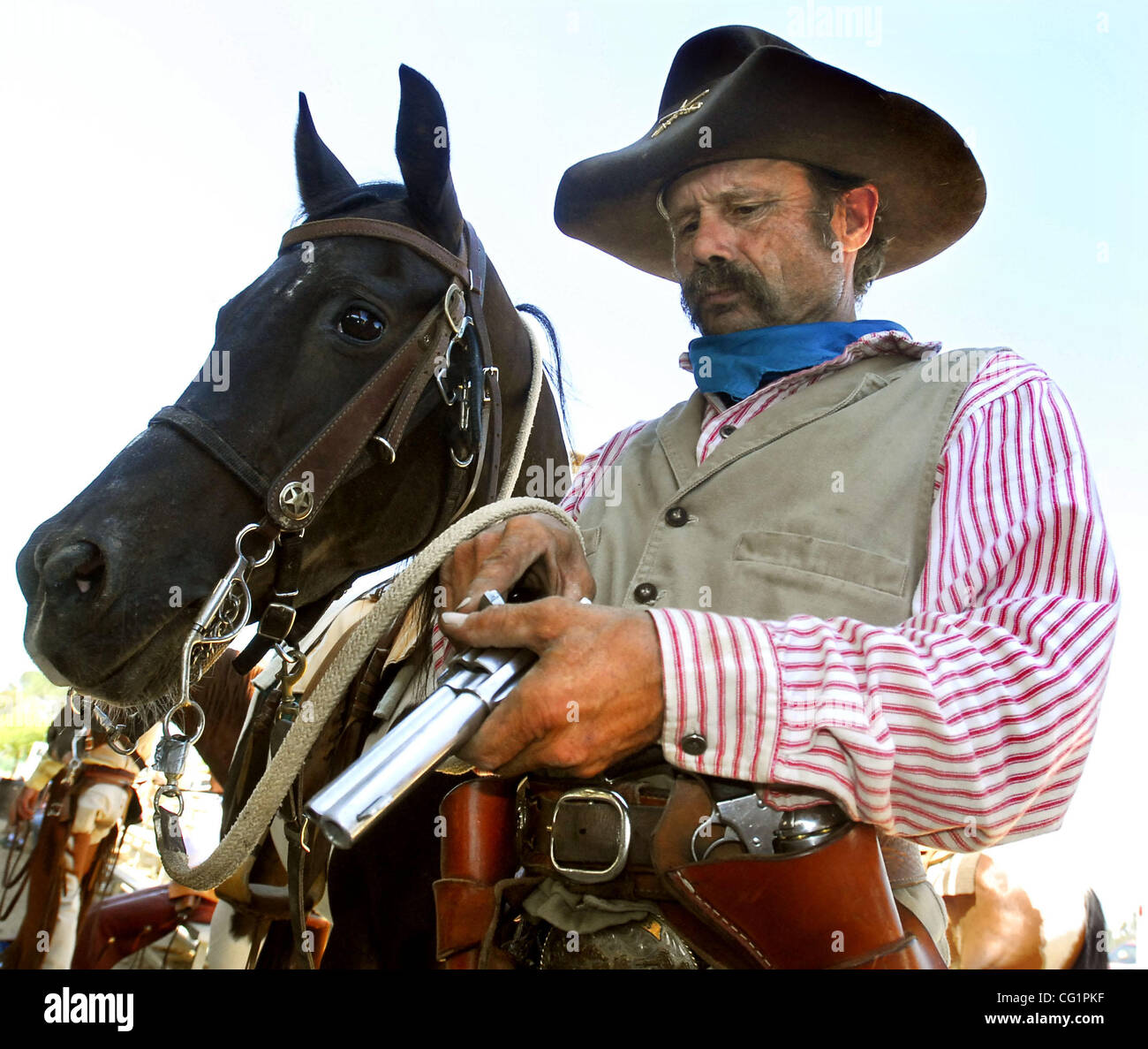 Cowboy mounted shooting hi-res stock photography and images - Alamy