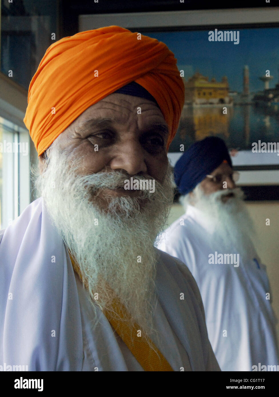 Religious workers from left Apar Singh and Gurdev Singh gather at the ...