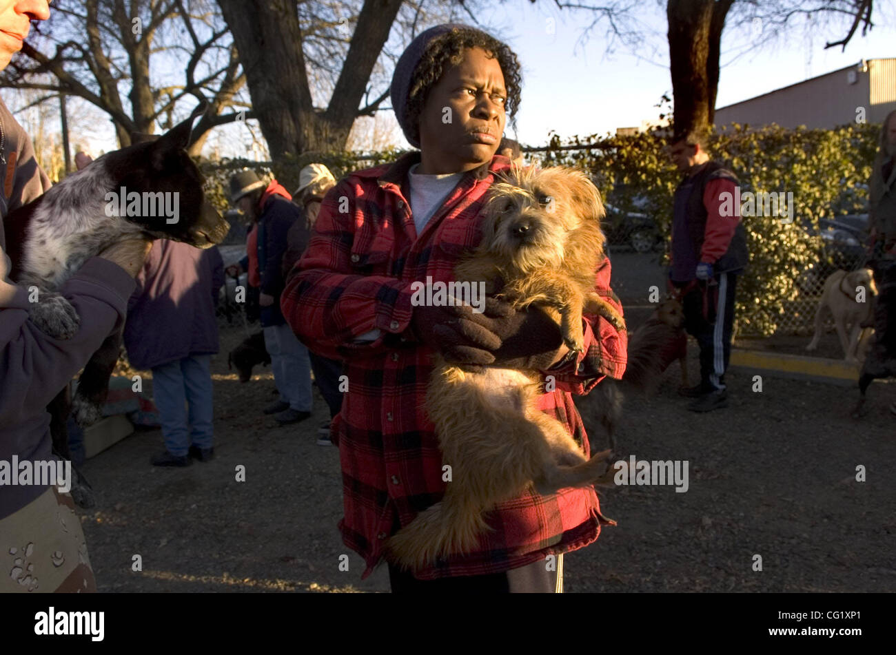 Virginia Gee holds Bear, who she has brought in for a checkup at the ...