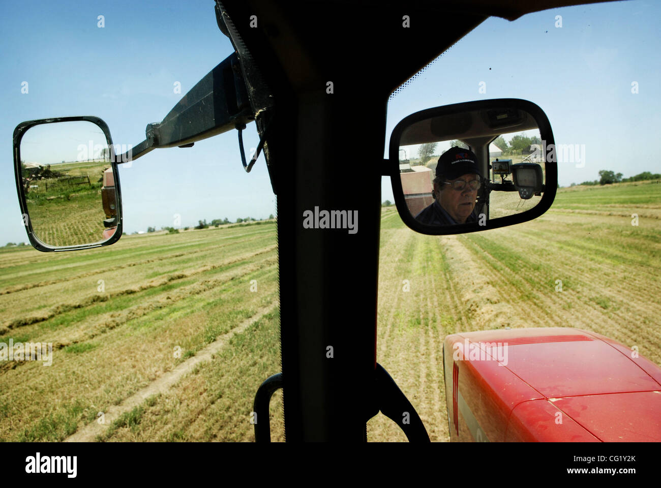 LEDE Case Van Steyn bales hay to feed his 1000 cows at his dairy farm ...