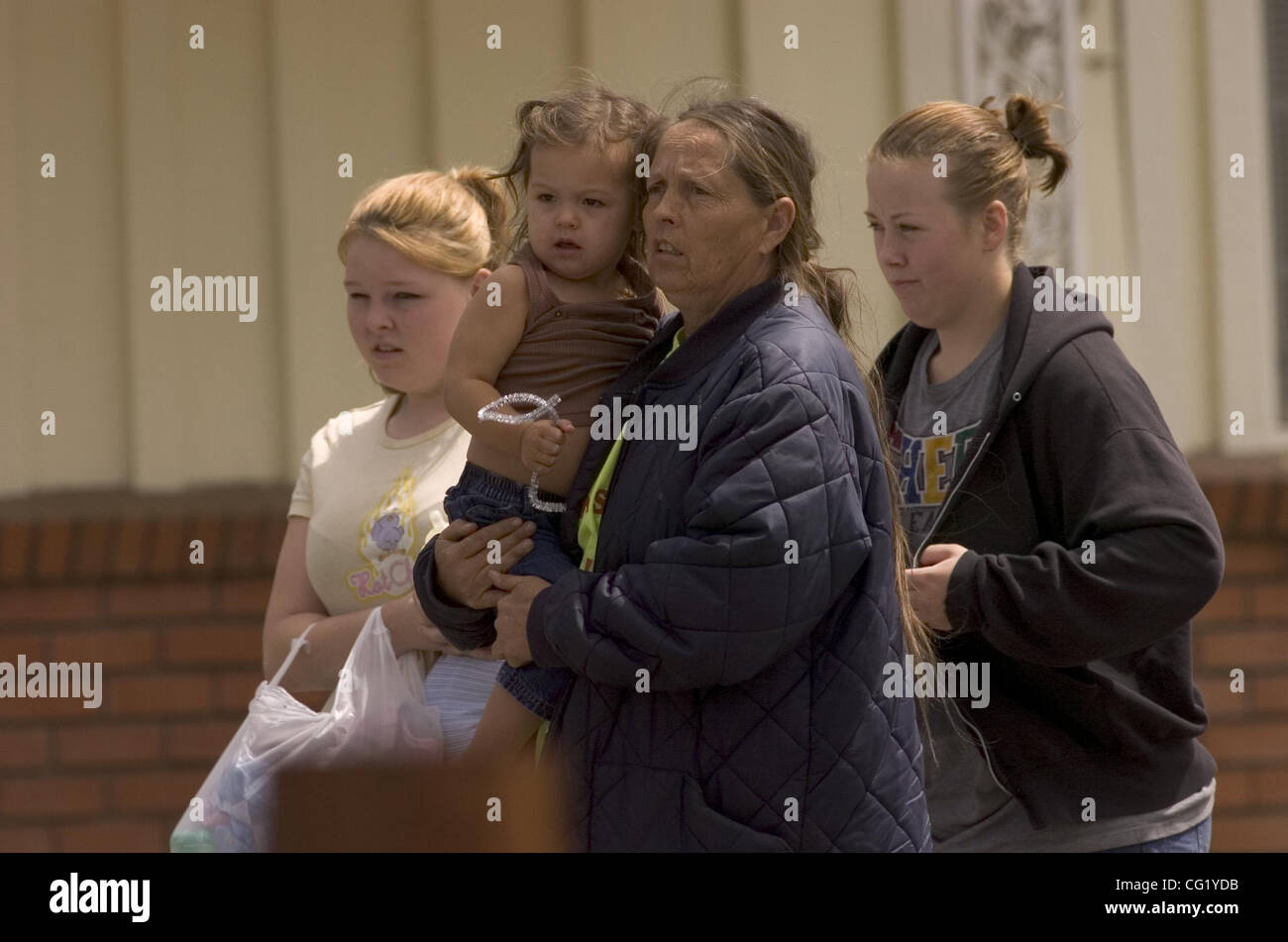 (PEOPLE WE BELIEVE TO BE FAMILY) leave the corner of Downie and Upland ...