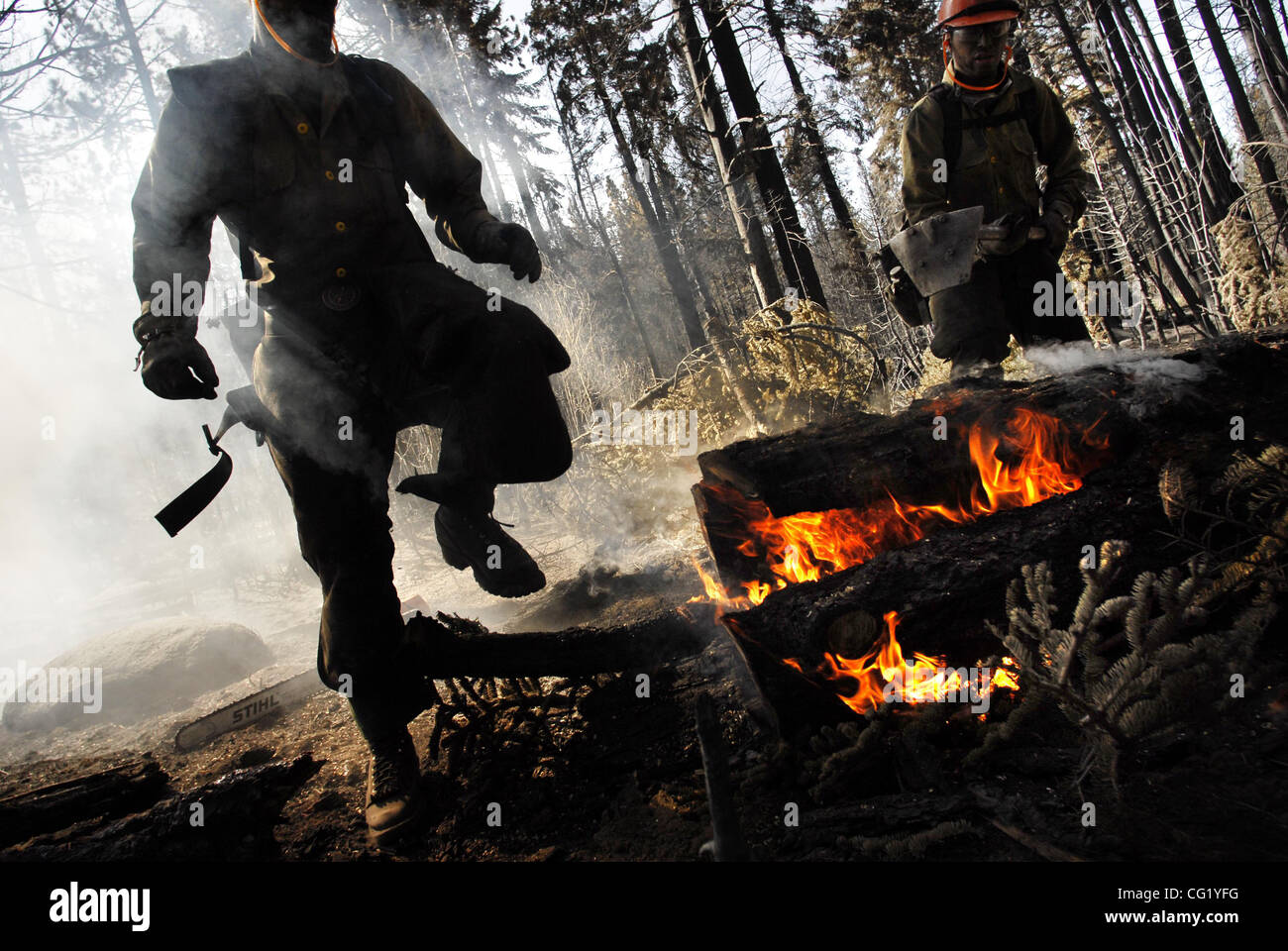 From left, Mendicino National Forest employees, Grayson Hartman, sawer ...