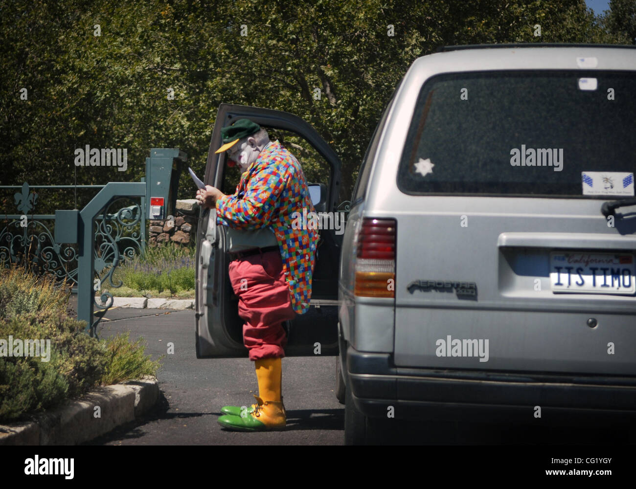 JUMP LEDE - (note suggested crop) Timo the clown tries to gain access ...