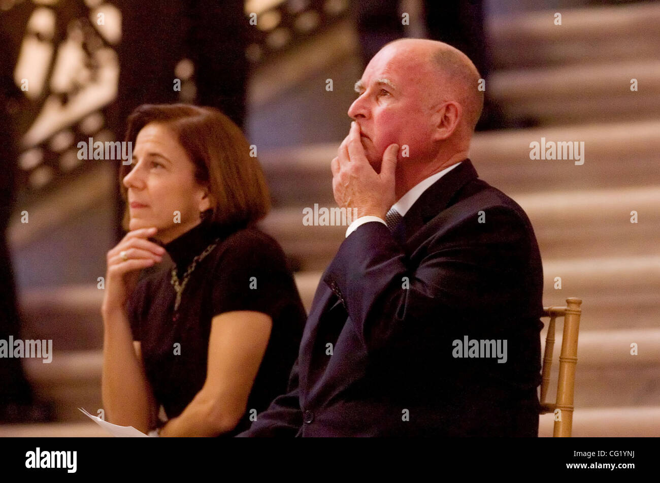 With his wife, Anne Gust at his side, Jerry Brown waits to be sworn in ...