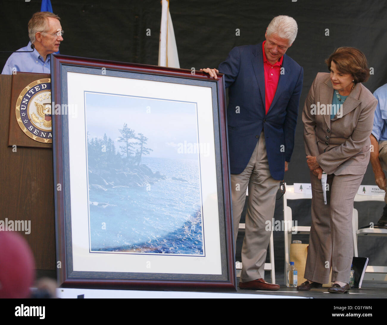 Former President Bill Clinton and US Senator Diane Feinstein, look at ...