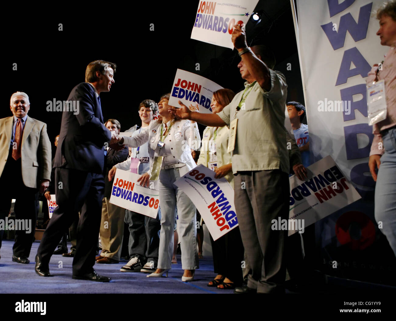 Former US Senator John Edwards thanks supporters on stage during the ...