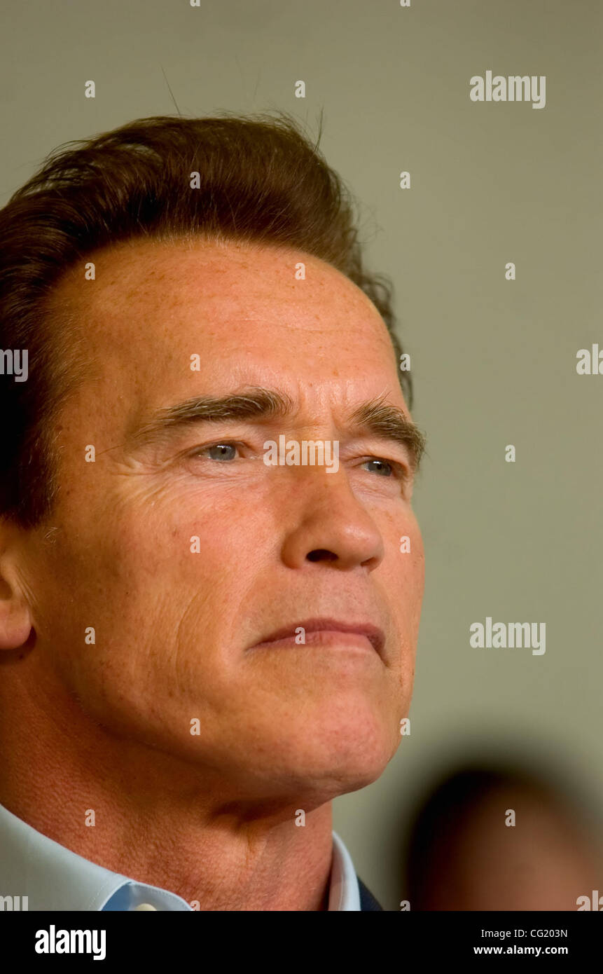 California Gov. Arnold Schwarzenegger, listens to the principal of Will ...