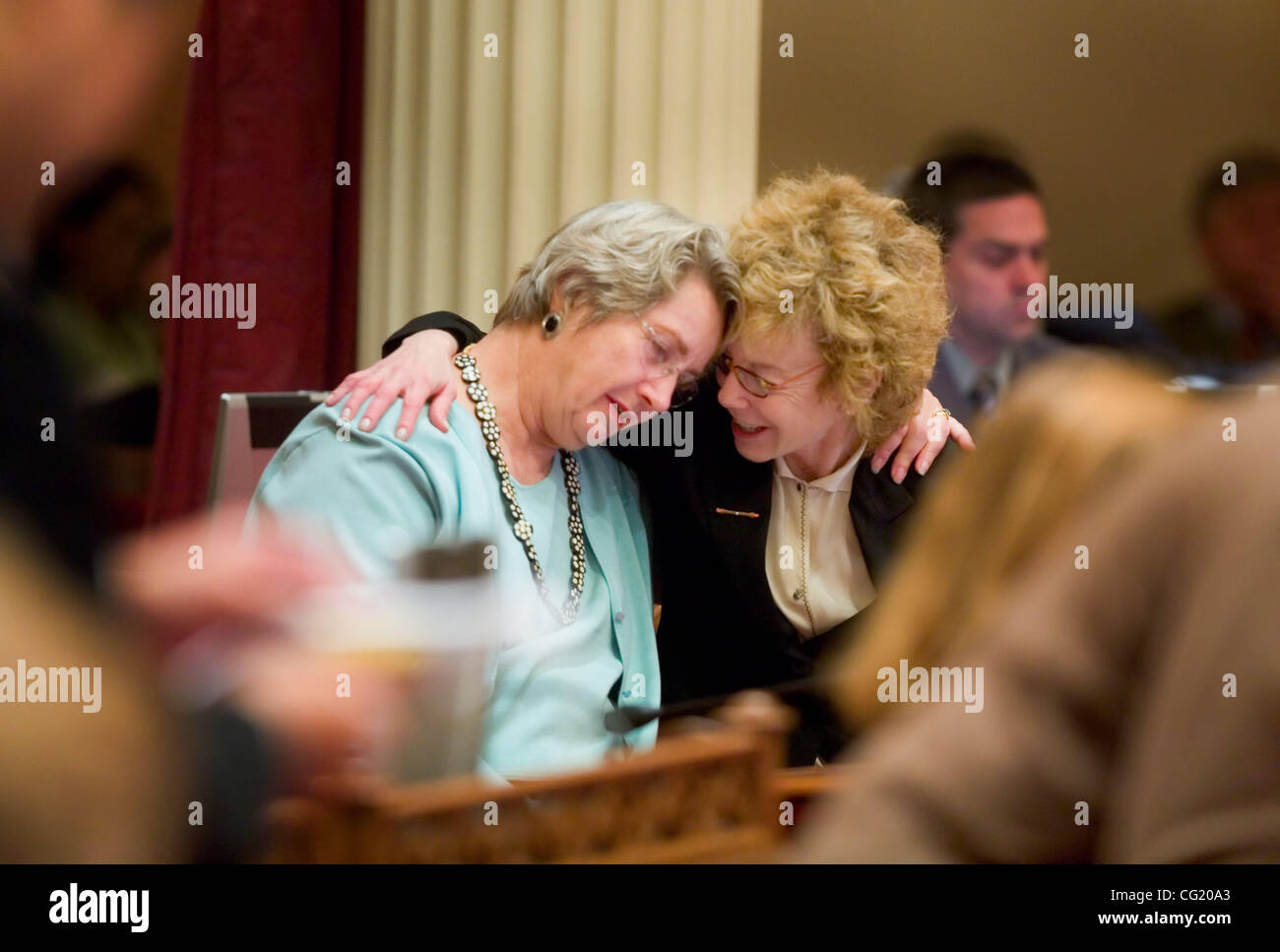 lede -- Senator Carole Migden, D-San Francisco, is hugged by Senator ...