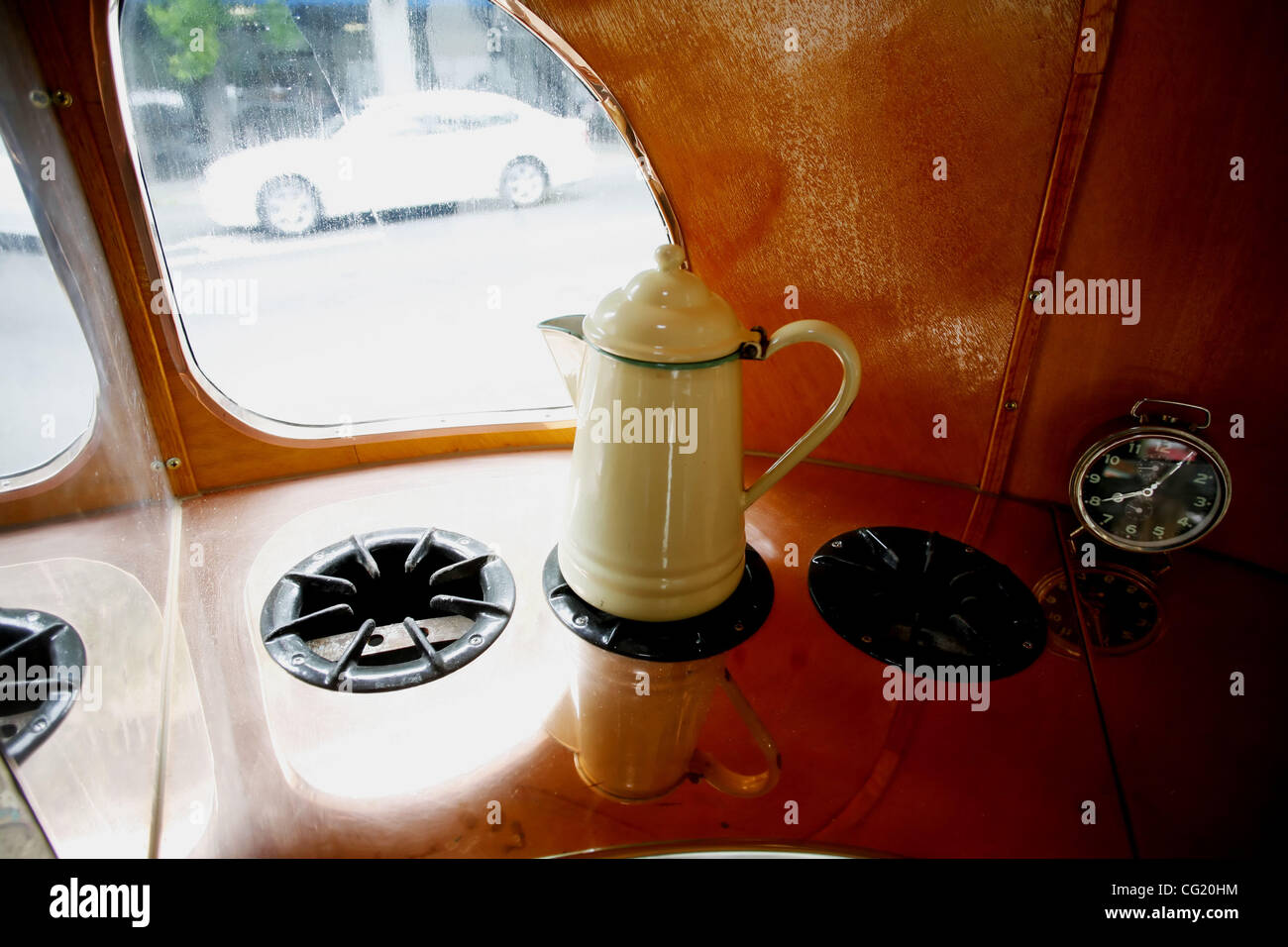 A coffee pot sits on the original burners inside the 1936 trailer owned ...