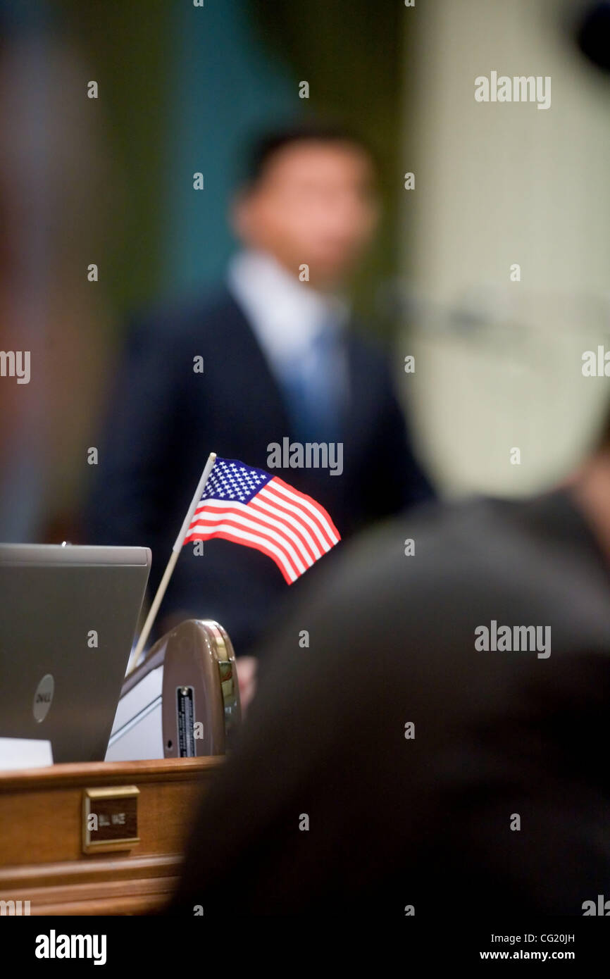 A flag sit on the desk of Bill Maze, R-Visalia, as Speaker Fabian Nunez ...