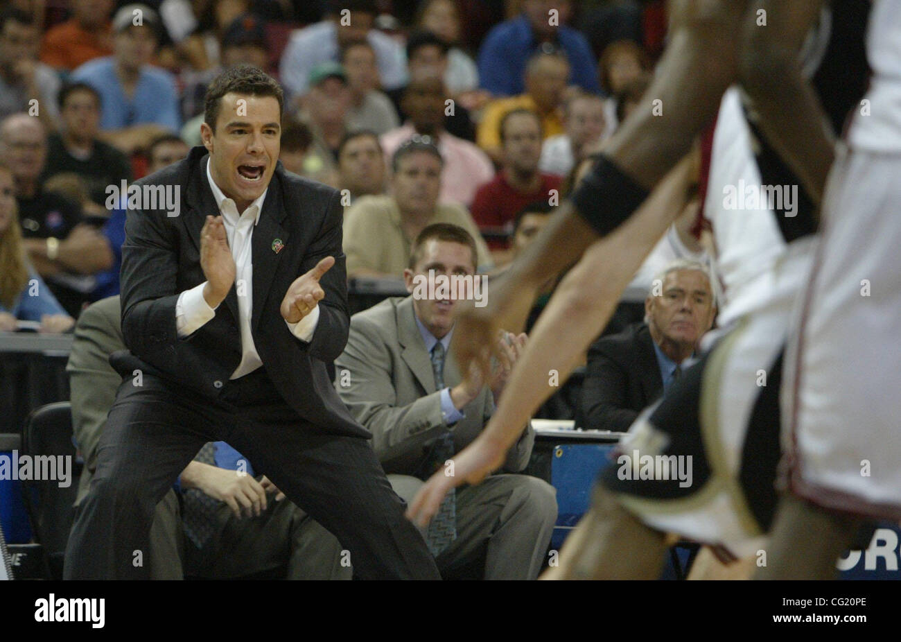 Tony Bennett yells instructilons to his team in the 2 half of their ...