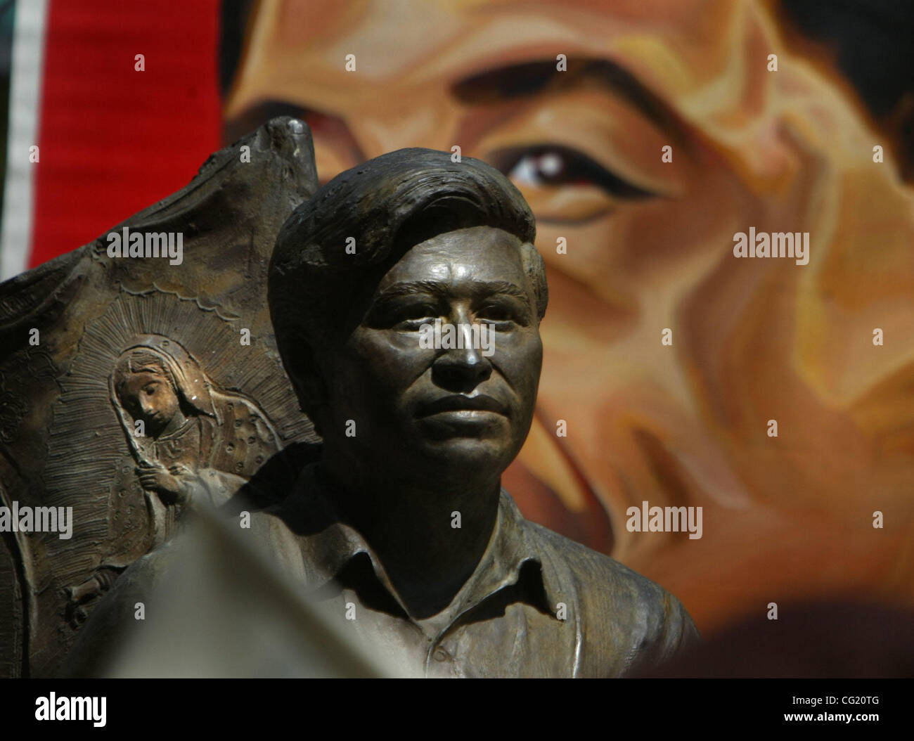 SECOND -- The Cesar Chavez statue at Cesar Chavez Plaza stands with a ...