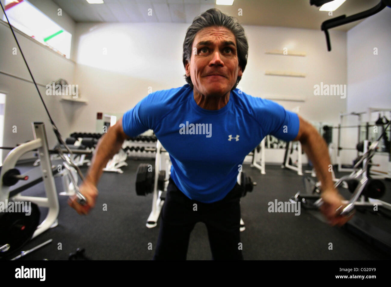 Danny Vierra pulls on some weights during a workout at a gym in Lodi ...