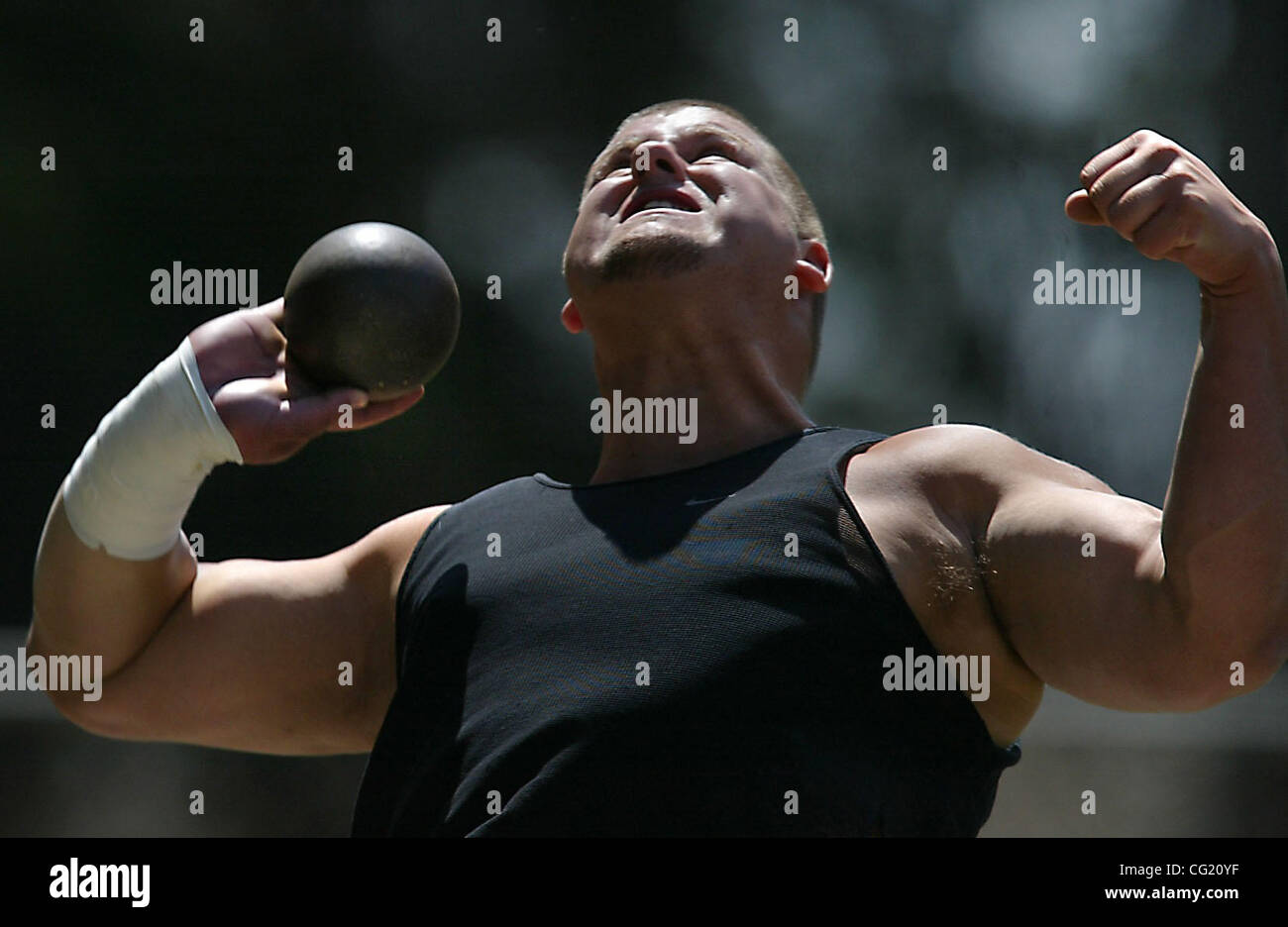 Sac State athlete Dave Nichols throws the shot during a practice at the ...