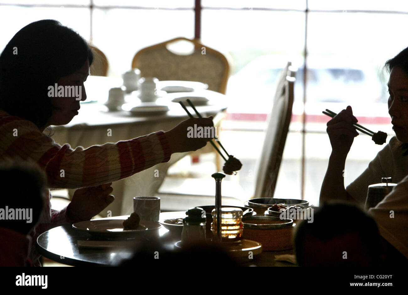 Customers at New Canton enjoy there food during a busy lunch time. New ...