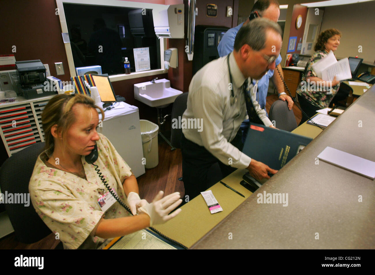LEDE Left, Cheri McKay an RN and Dr. Dan Bolster, Right work along with ...