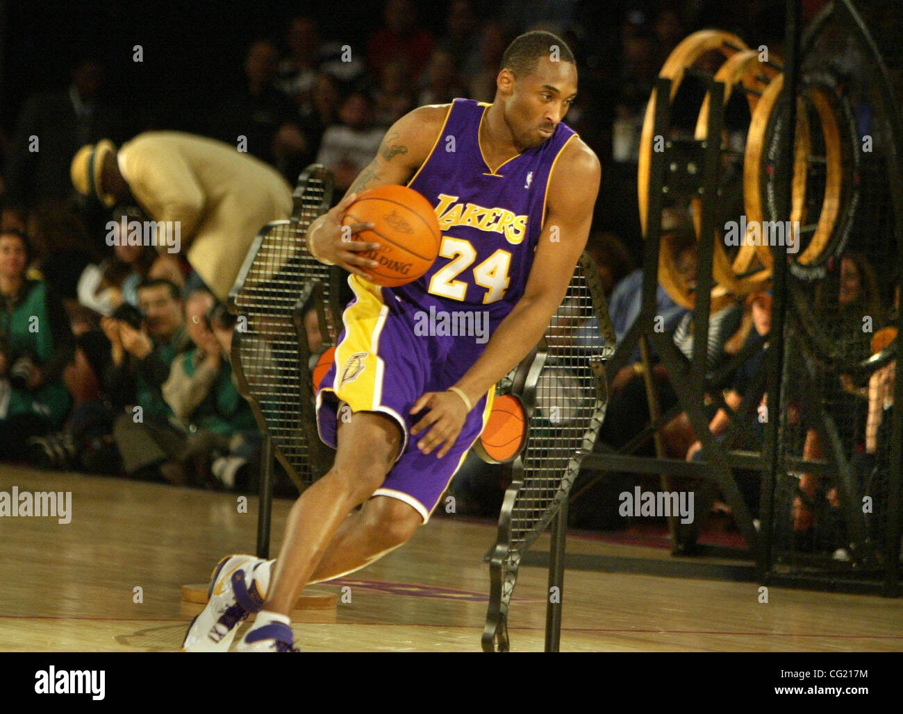 With Shaquille O' Neal in the background getting up Kobe Bryant makes ...