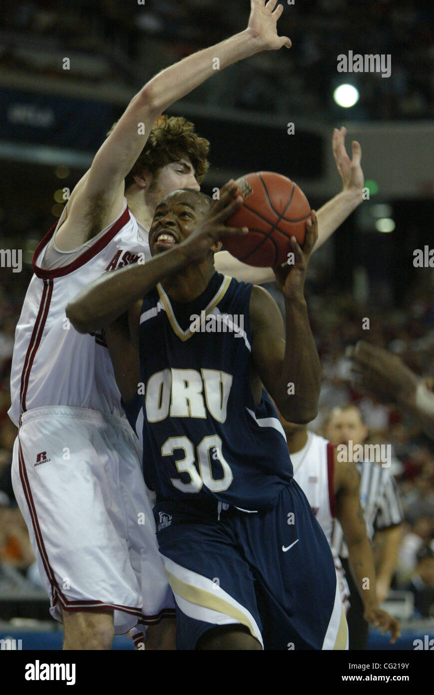 Oral Robert's Caleb Green drives to the hoop past Washington State's ...