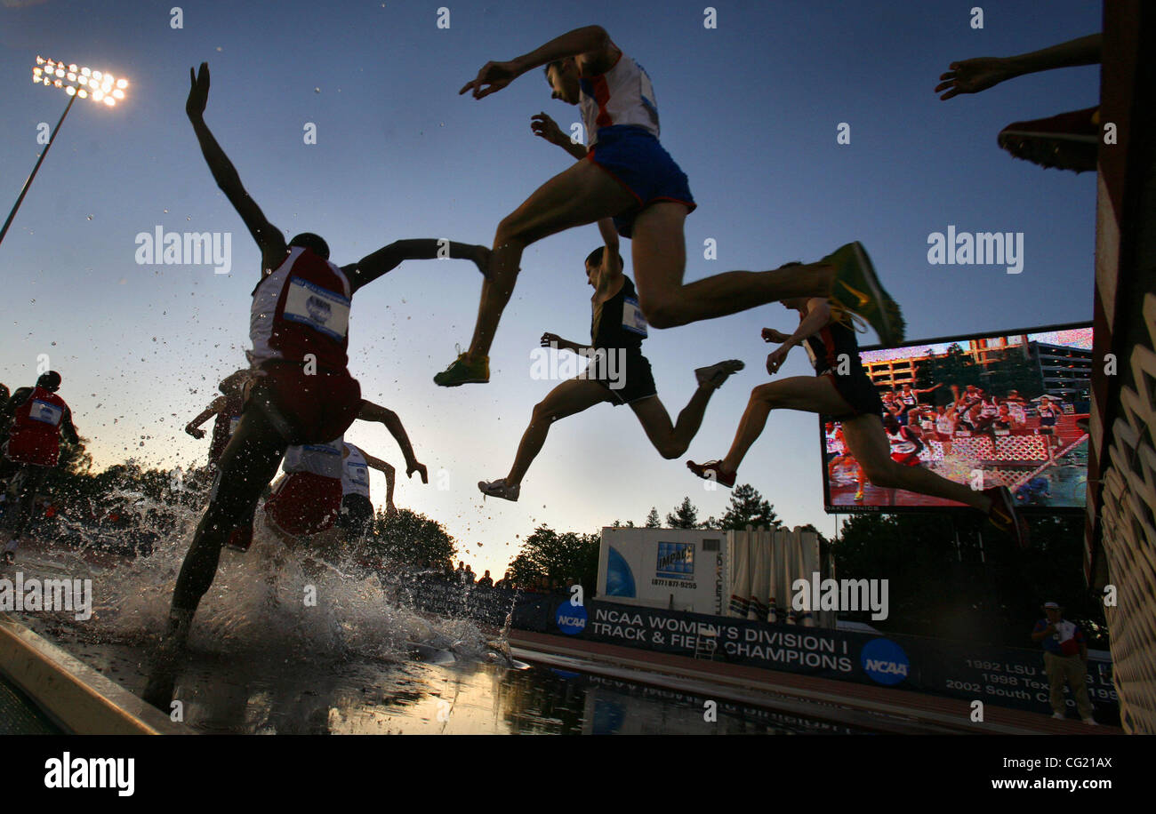 Over the Steeple in the mens semifinal in the 3000 meter steeplechase ...