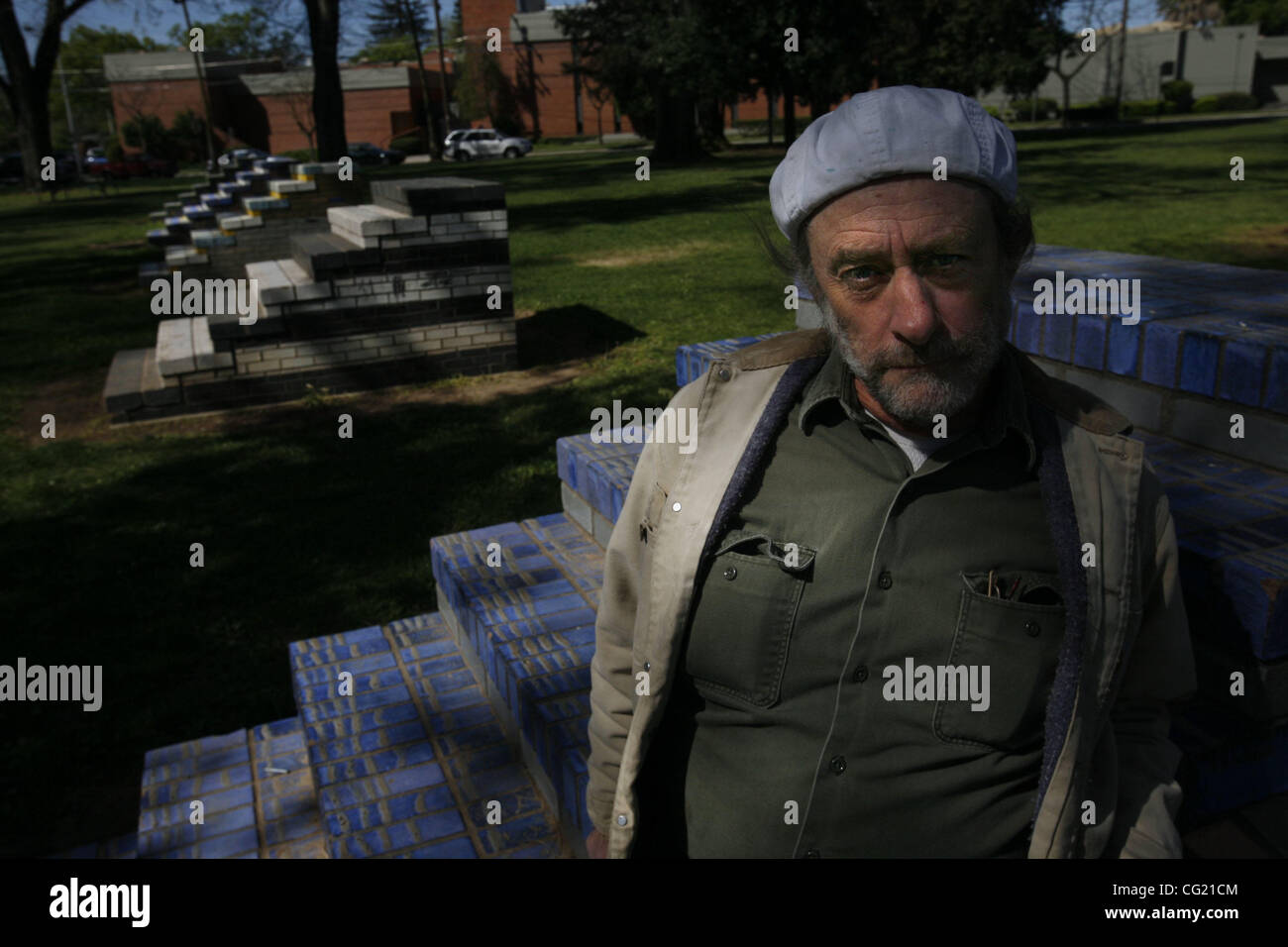 SECONDARY: Ron Emslie sits on the steps at McClatchy Park in the Oak ...