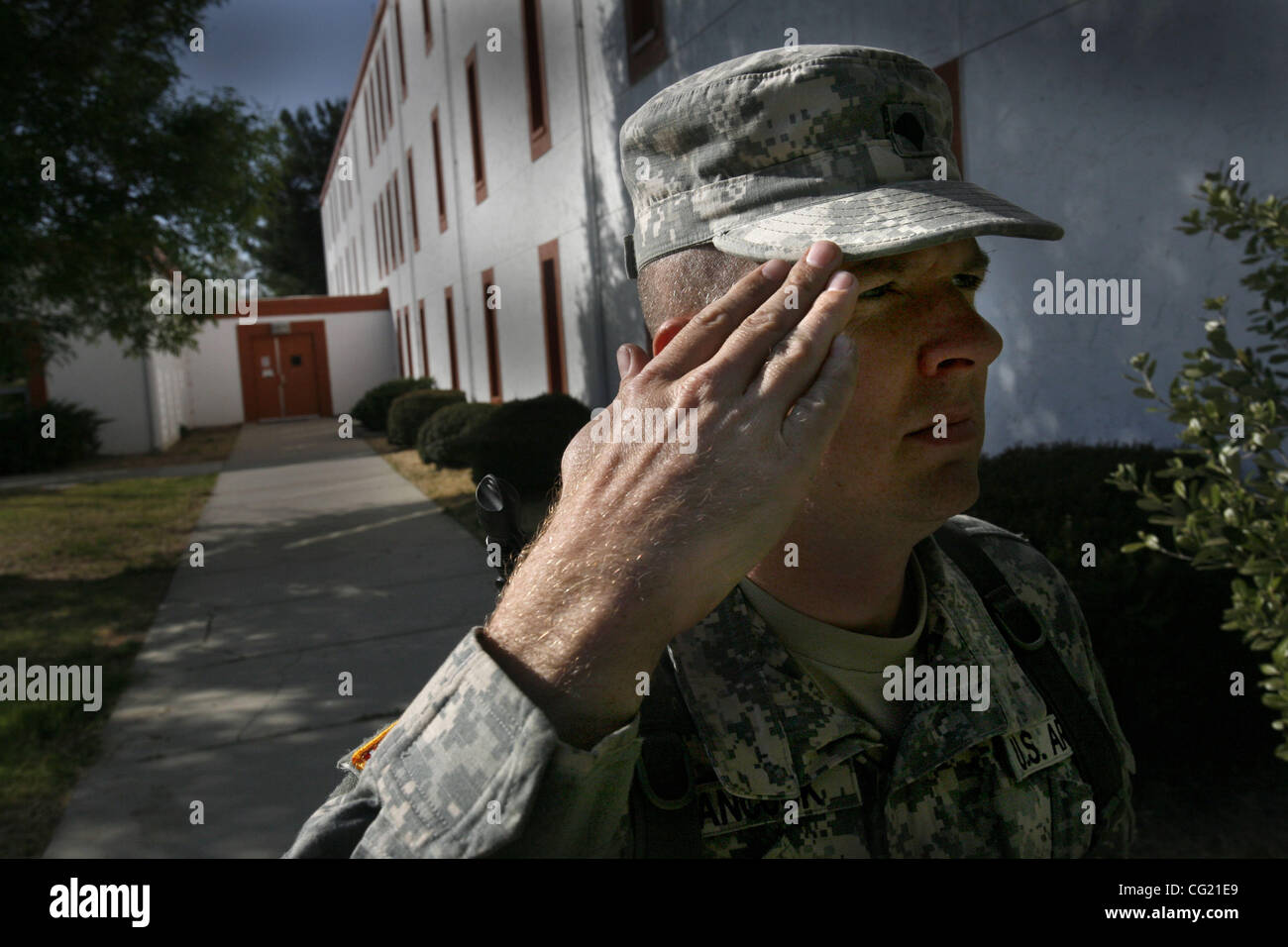 Brian Hancock salutes as taps his played over the loud speaker as he ...