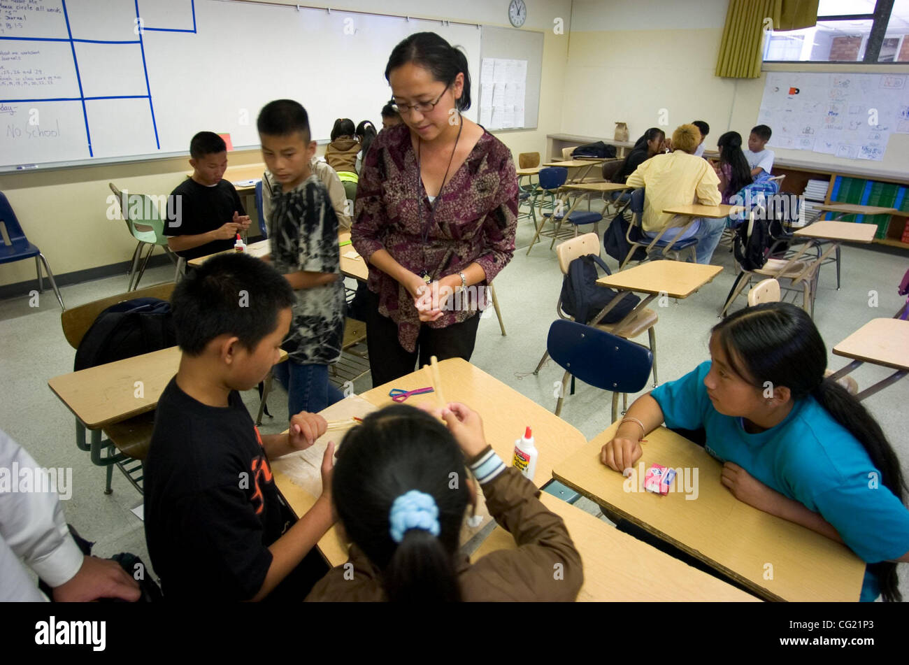 Goethe Junior High Summer School teacher Susan Lee, center, leads a ...