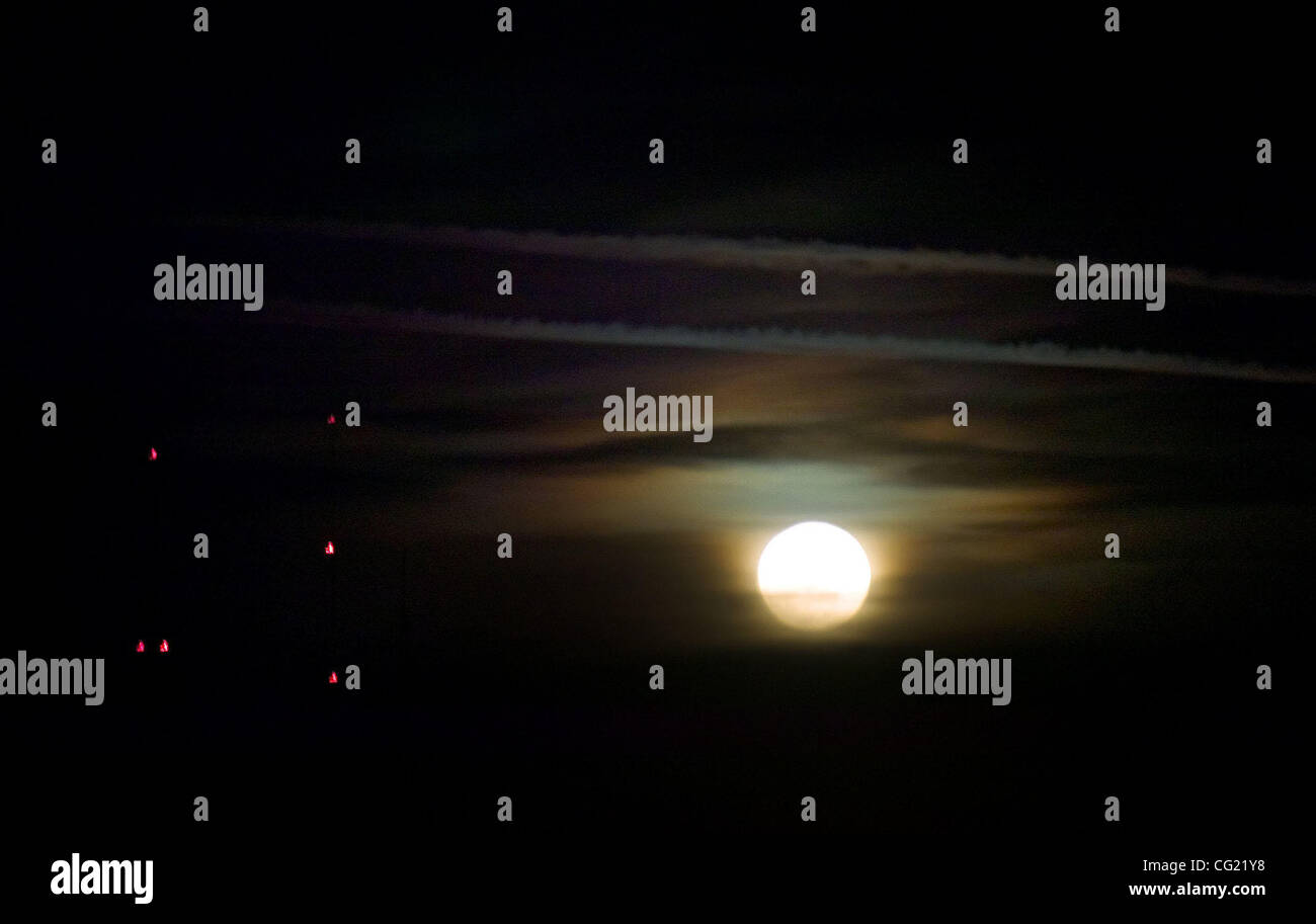 A full Moon rises over Sacramento's eastern horizon Monday, April 2 ...