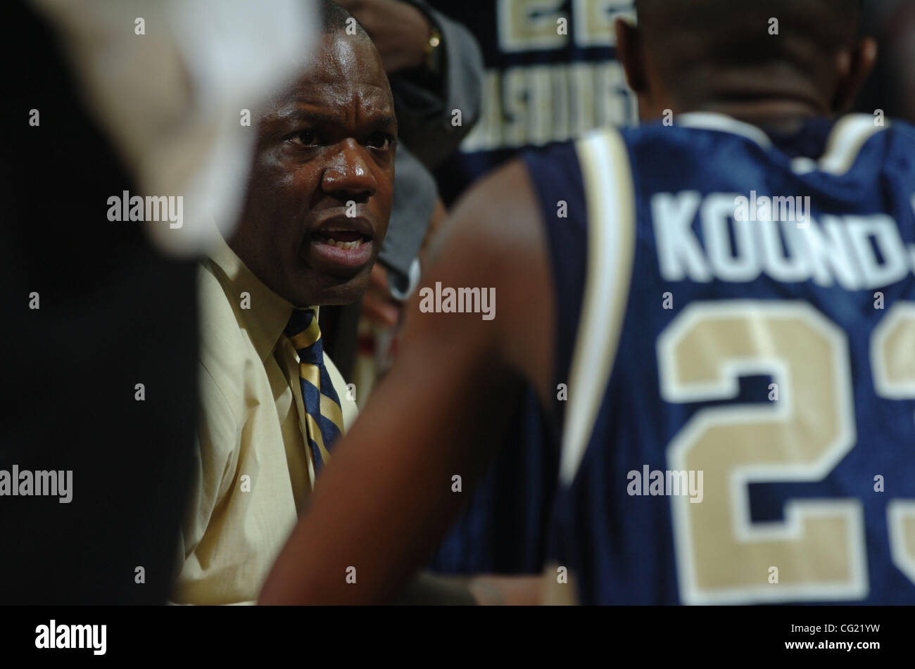MCT ZUMA 031507 George Washington's head coach Kark Hobbs talks with ...
