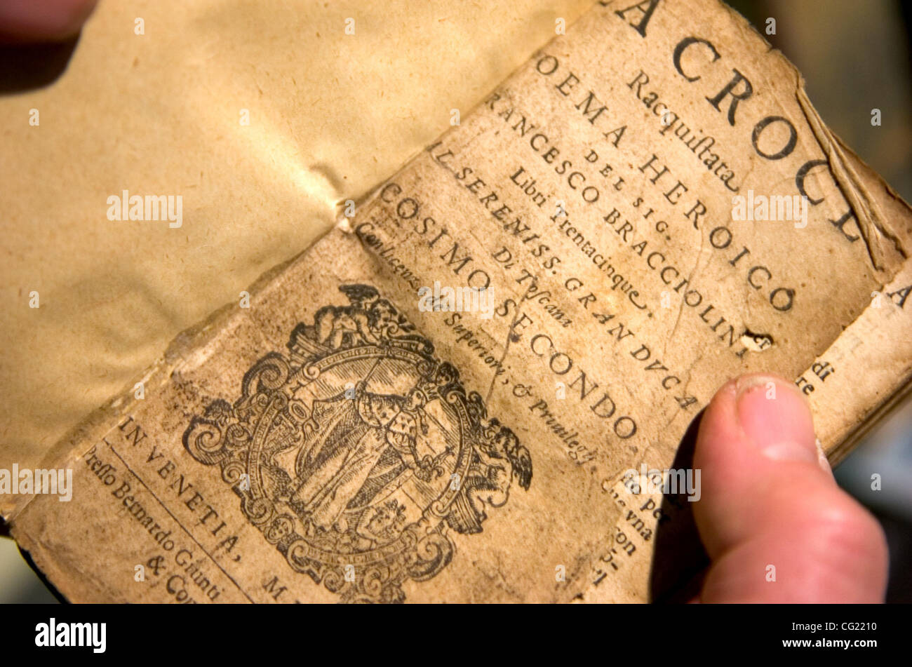 Bay Area book dealer Carl Blomgren displays a poem published in 1614 ...