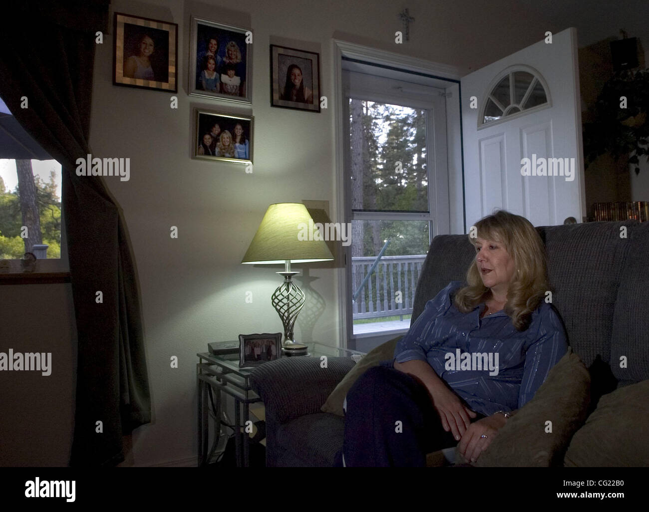 LEDE-- Debbie Romero (cq) , 43, relaxes on her living room couch ...