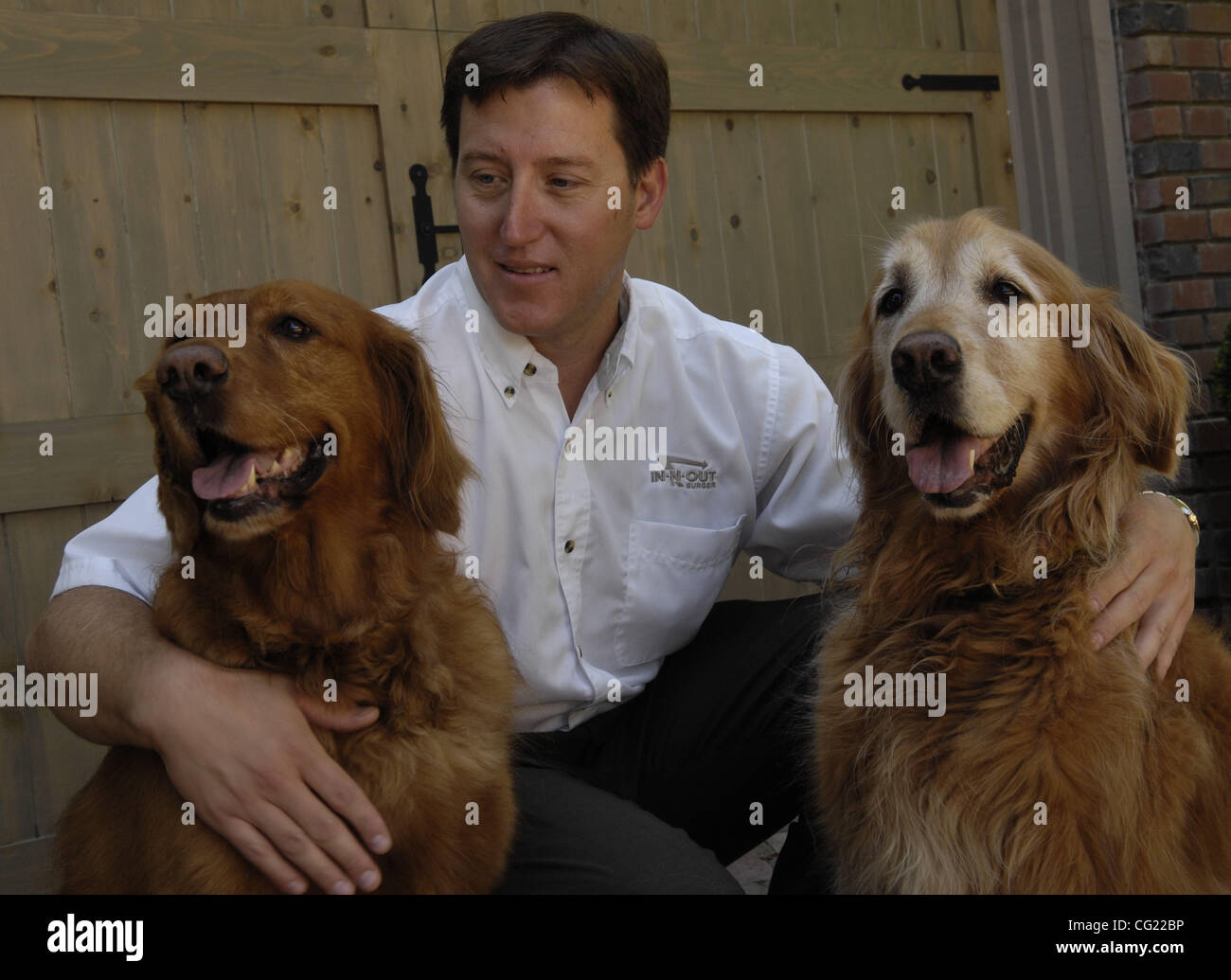Doug Alcorn with Buddy and Holly both are 7 years old. Doug is hosting ...