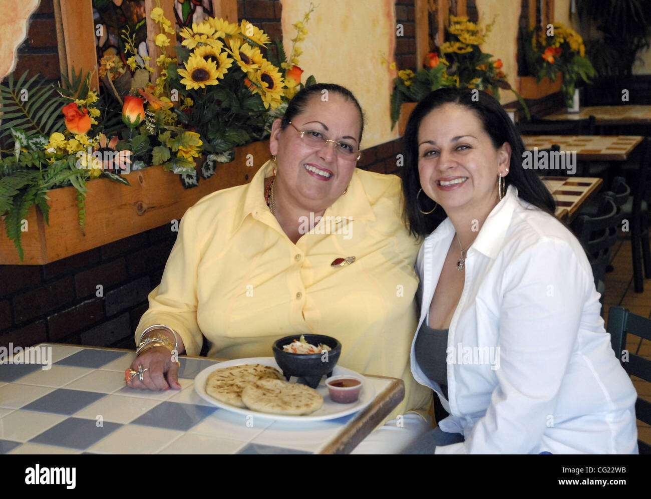 SECOND - Maria Diaz (left) and her daughter Ruby Moreno (right) operate ...