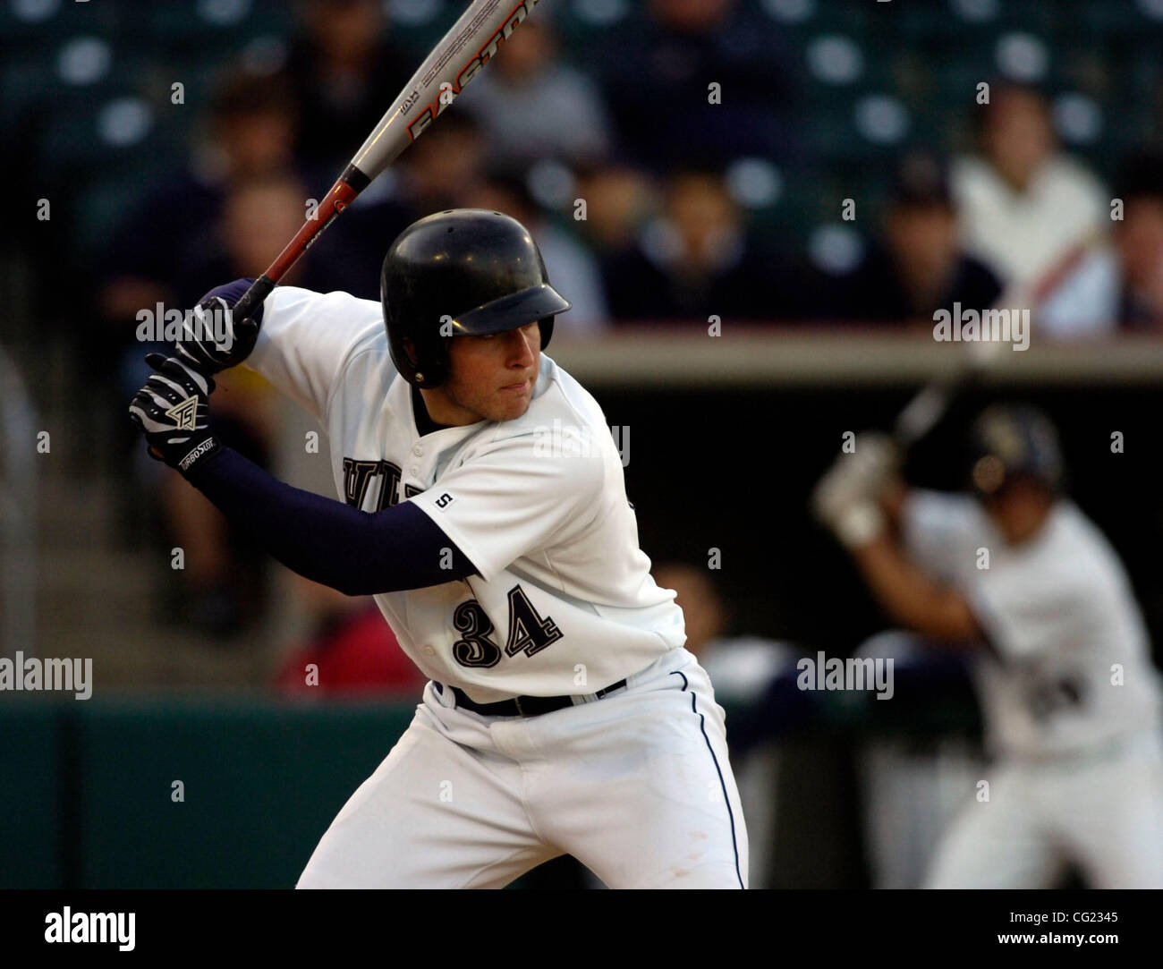 Elk Grove catcher David Freitas, #34, bats during the game against ...
