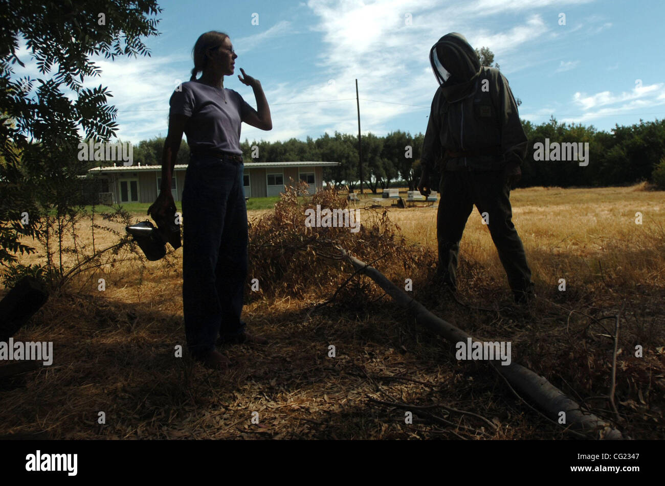 UC Davis' Sue Cobey, left, talks with John Pollard, a visiting ...