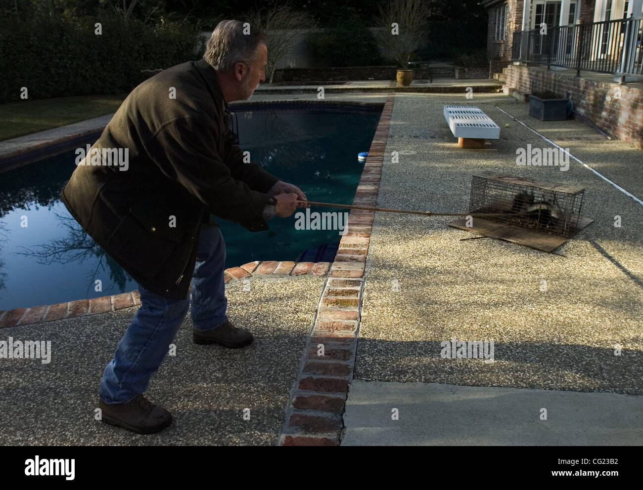 Larry Manger , also known as "Larry the Trapper" has a job of removing ...